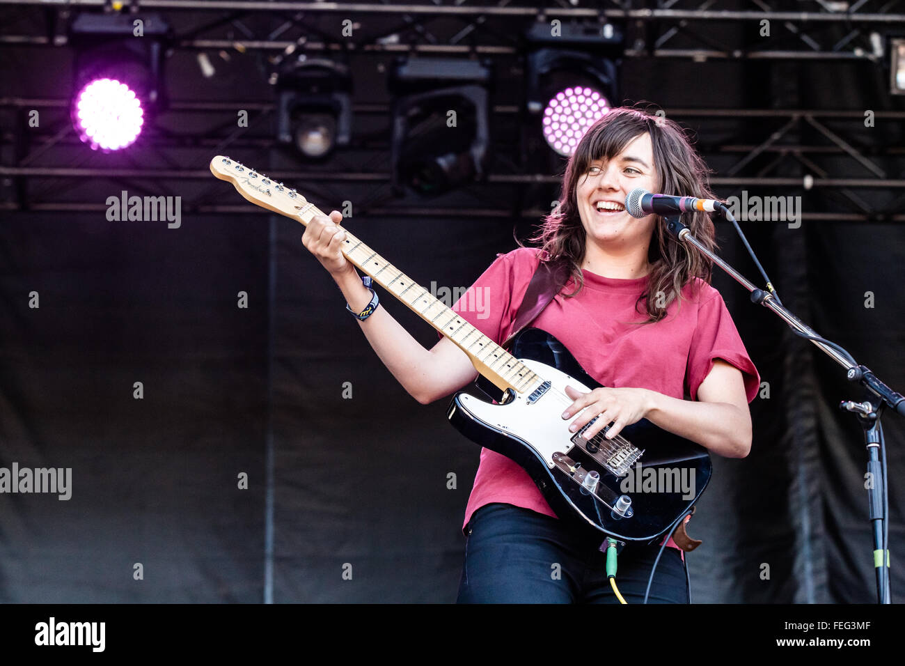 Courtney Barnett performing live in the summer of 2015 at an outdoor ...