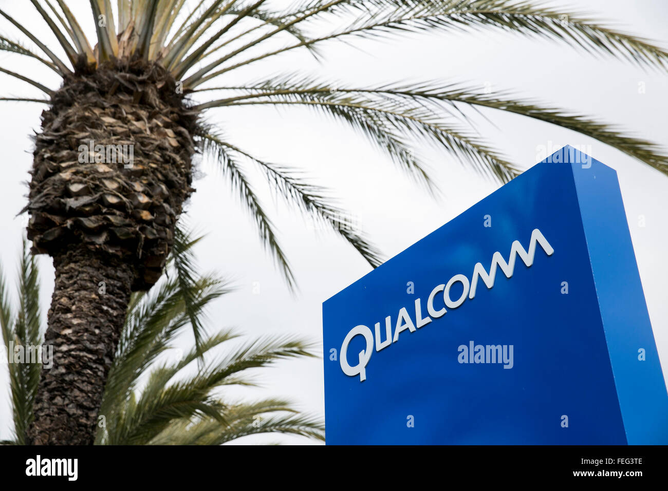 A logo sign outside of a facility occupied by Qualcomm in San Diego ...