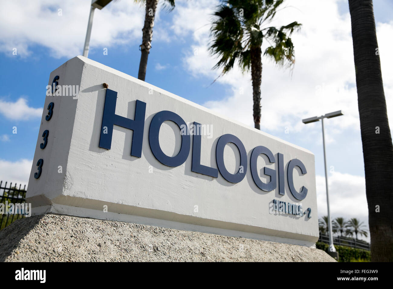 A logo sign outside of a facility occupied by the Hologic Corporation ...