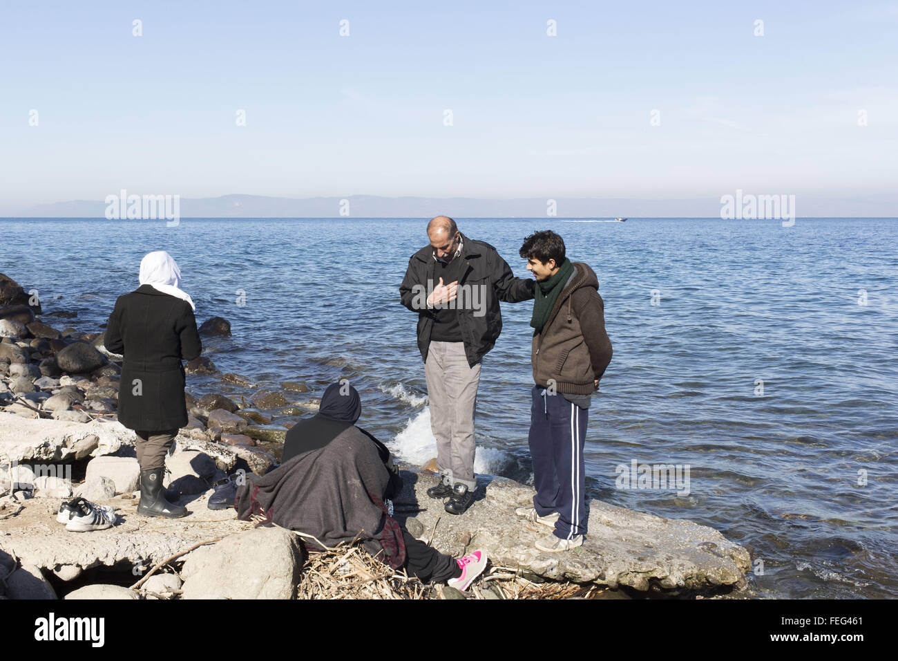 Syrian refugees just after the got off the boat in a Lesvos beach. The ...