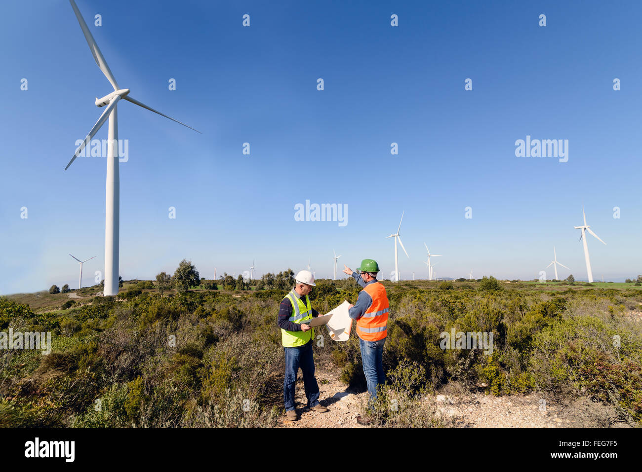 Wind turbine worker standing hi-res stock photography and images - Alamy
