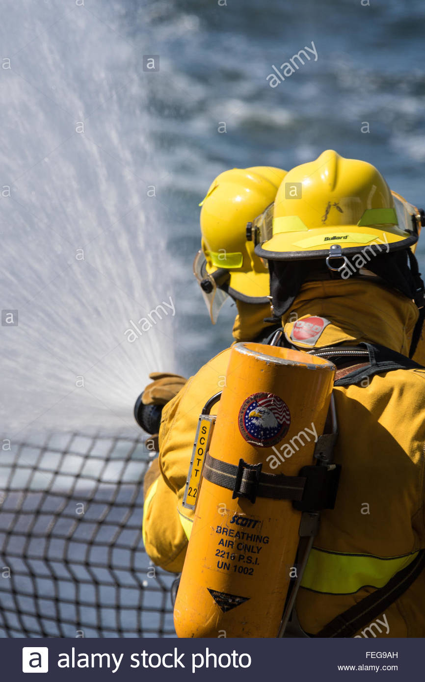 Firefighter Hose Stock Photos & Firefighter Hose Stock Images - Alamy