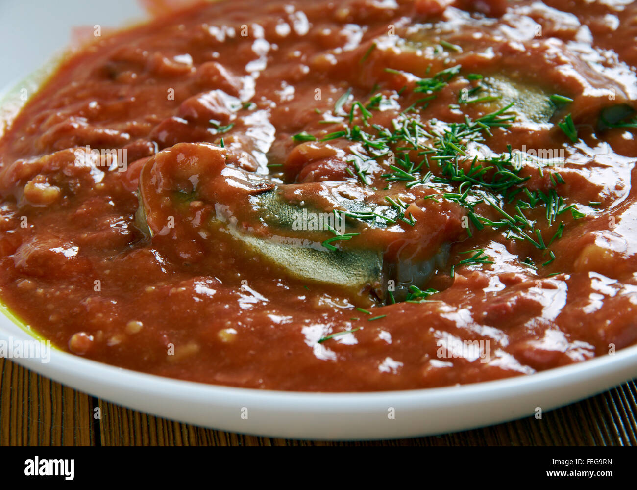 Frejon and Fish Stew. bean soup served with fish stew, peppered snail ...