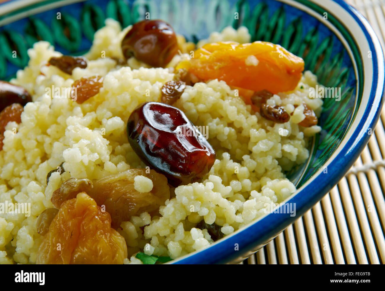 Mauritania dish - Sweet couscous with apricots, raisins and dates Stock ...