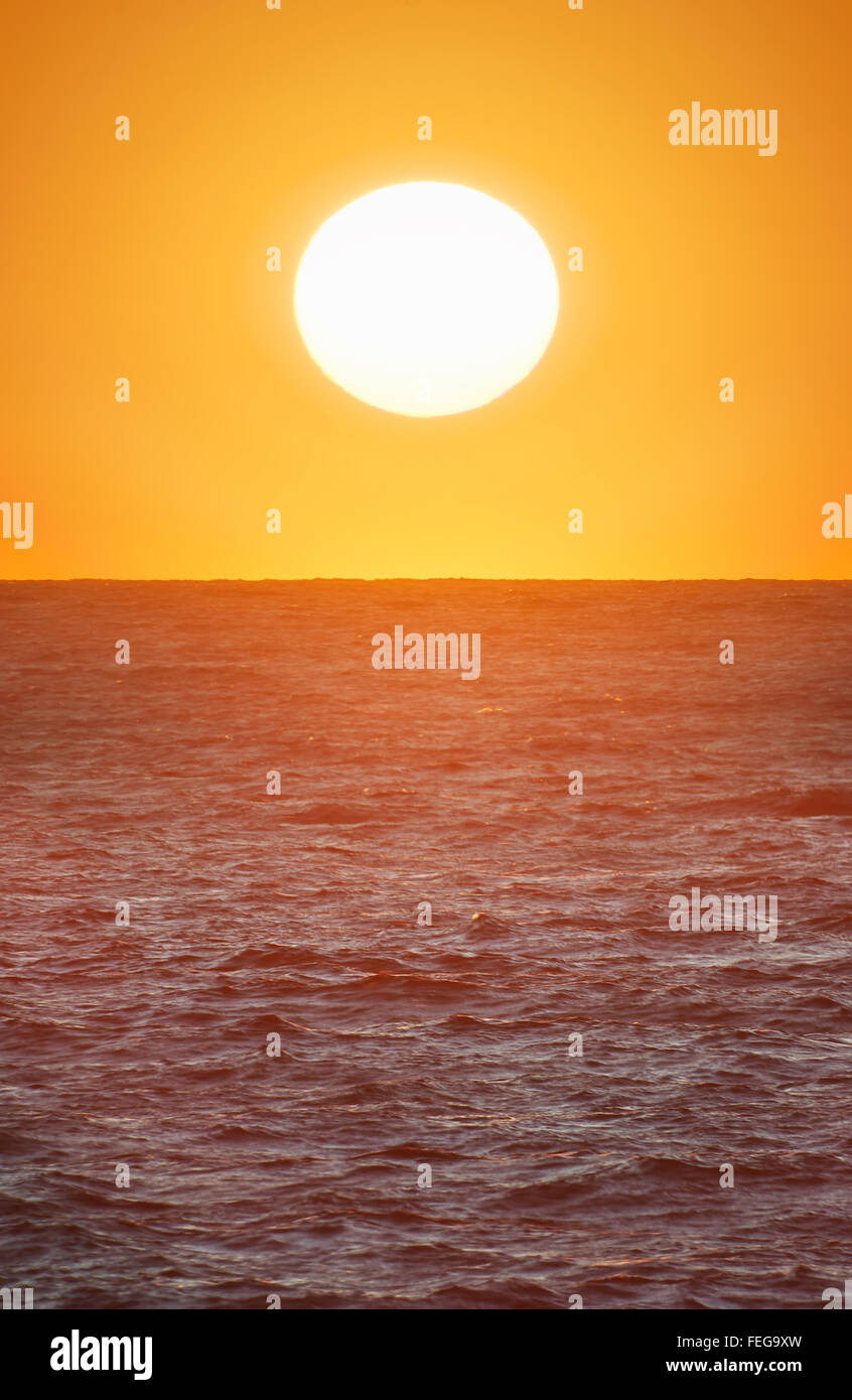 Big sun on the sea. Nature composition Stock Photo - Alamy