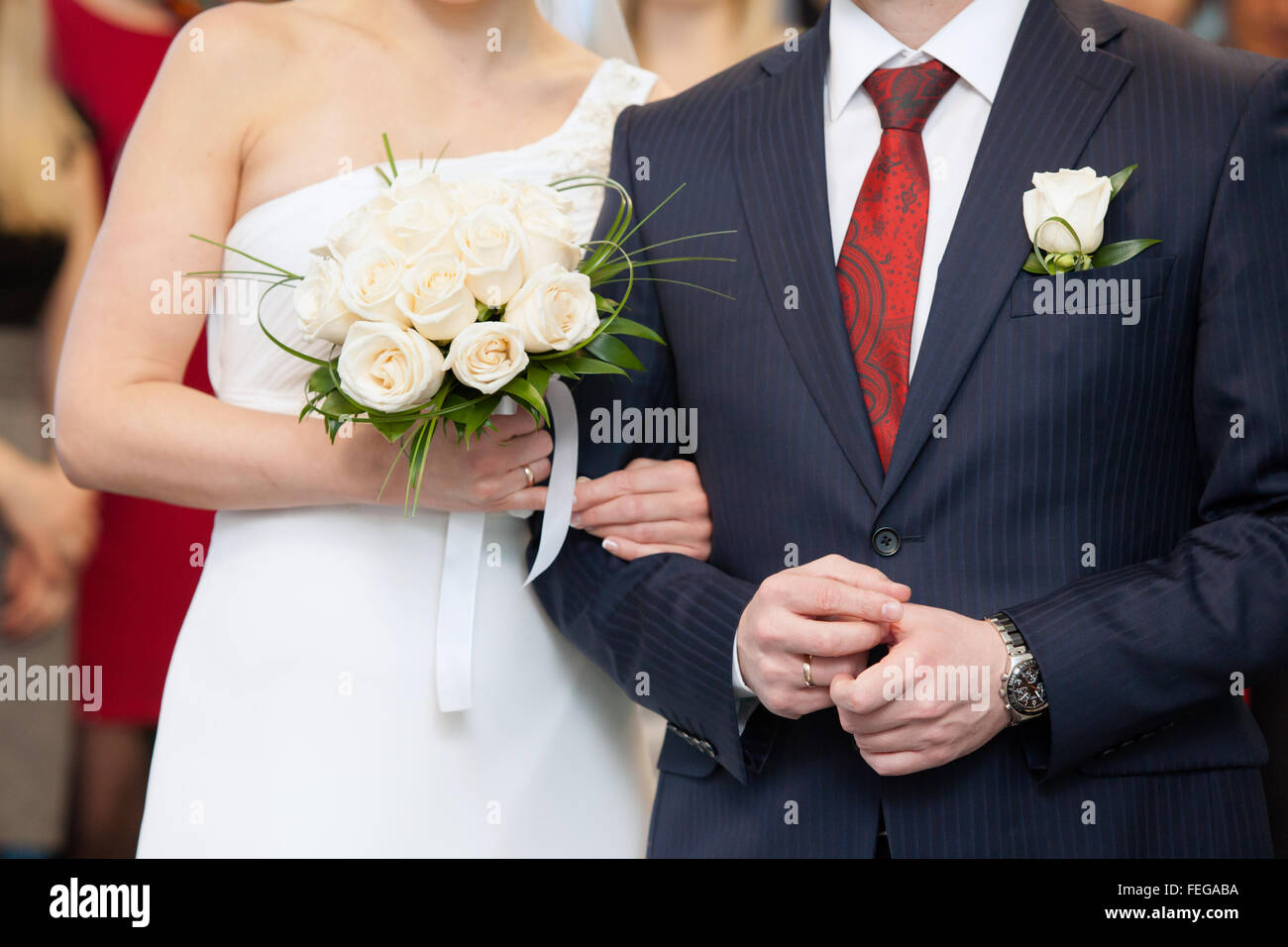 the groom holds the bride by a hand at a wedding Stock Photo - Alamy