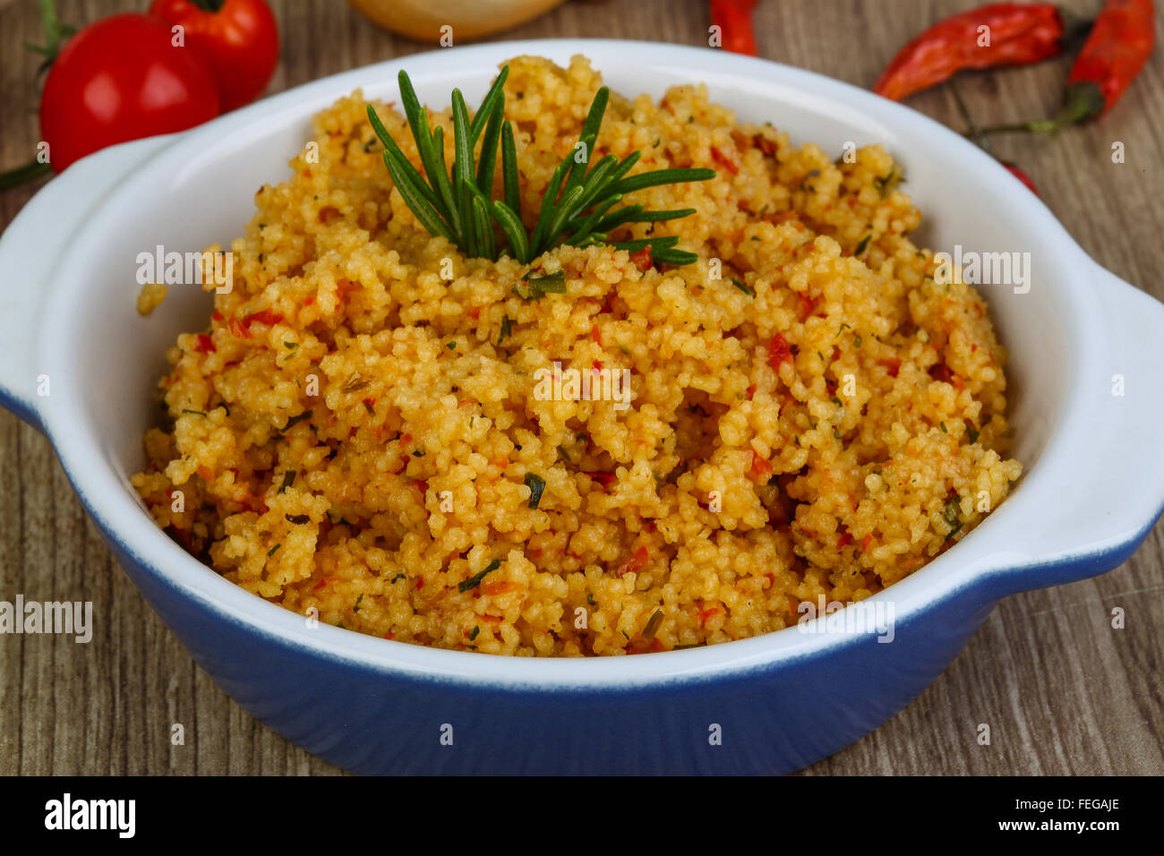 Arabic traditional cuisine - Couscous with tomato and green onion Stock ...