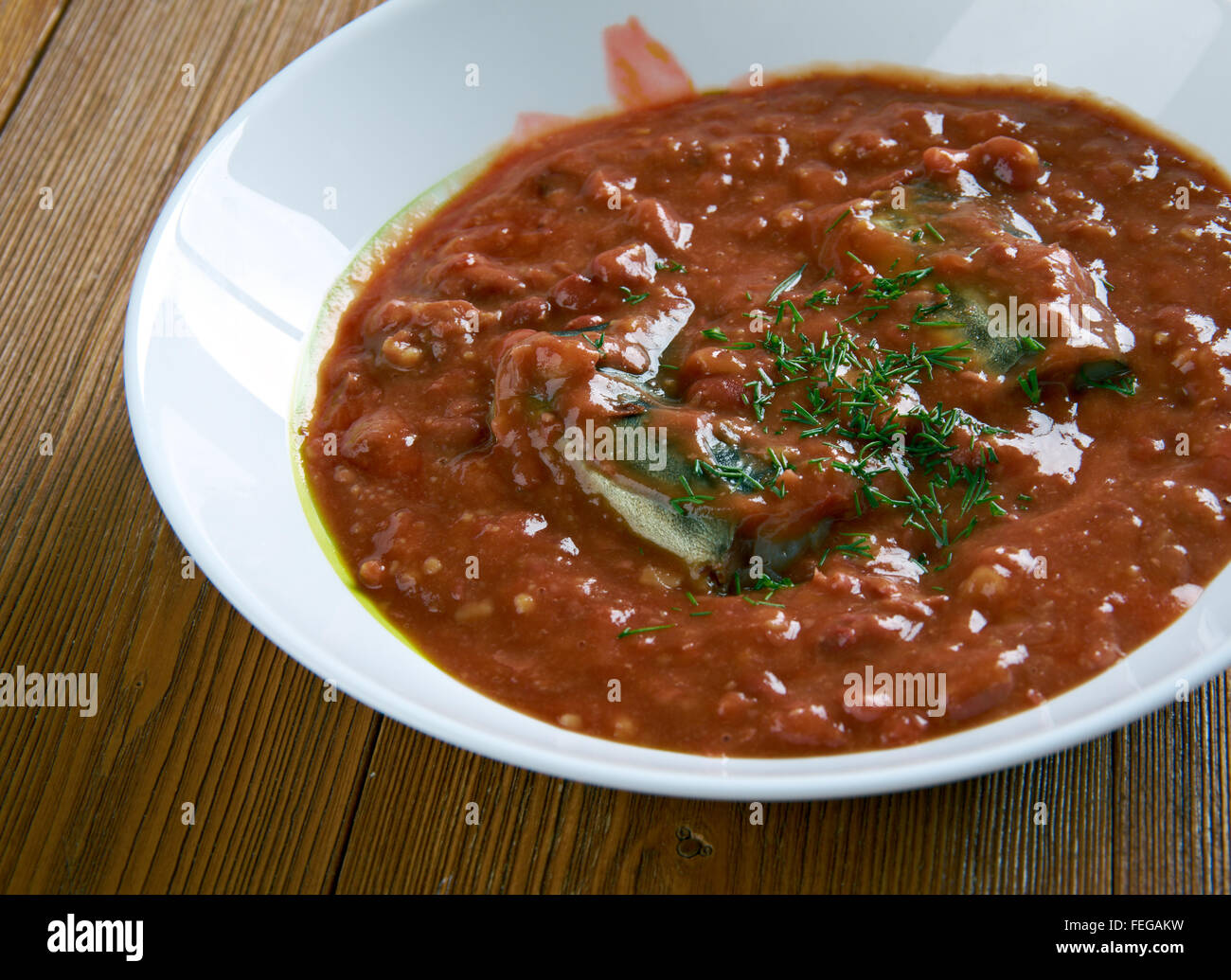 Frejon and Fish Stew. bean soup served with fish stew, peppered snail ...
