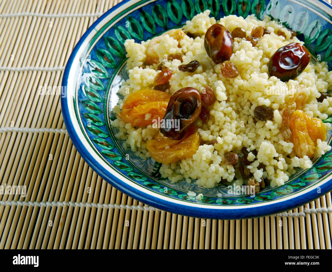 Mauritania dish - Sweet couscous with apricots, raisins and dates Stock ...