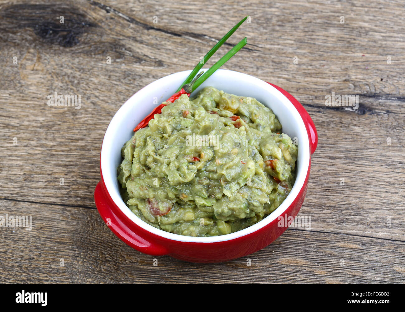 Mexican cuisine - Guacamole - avocado, tomato, pepper and onion Stock ...