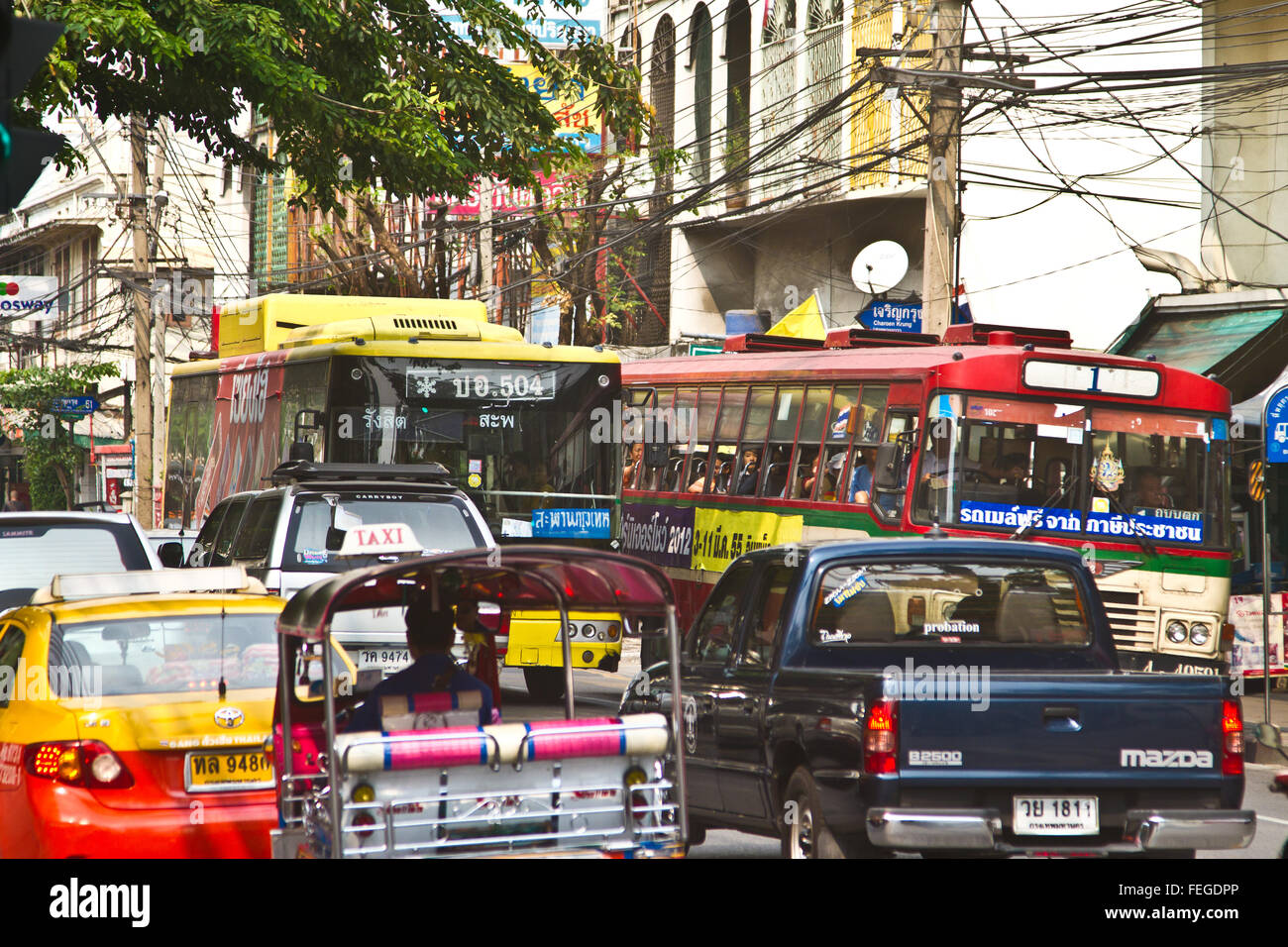 Bus in the streets of the city of Bangkok Stock Photo - Alamy
