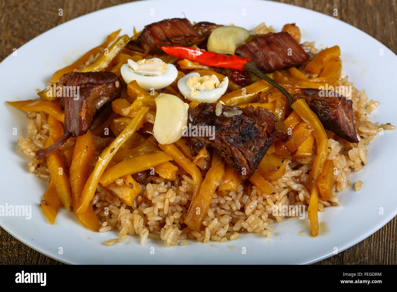 Rice with beef - Uzbek traditional cuisine Stock Photo - Alamy