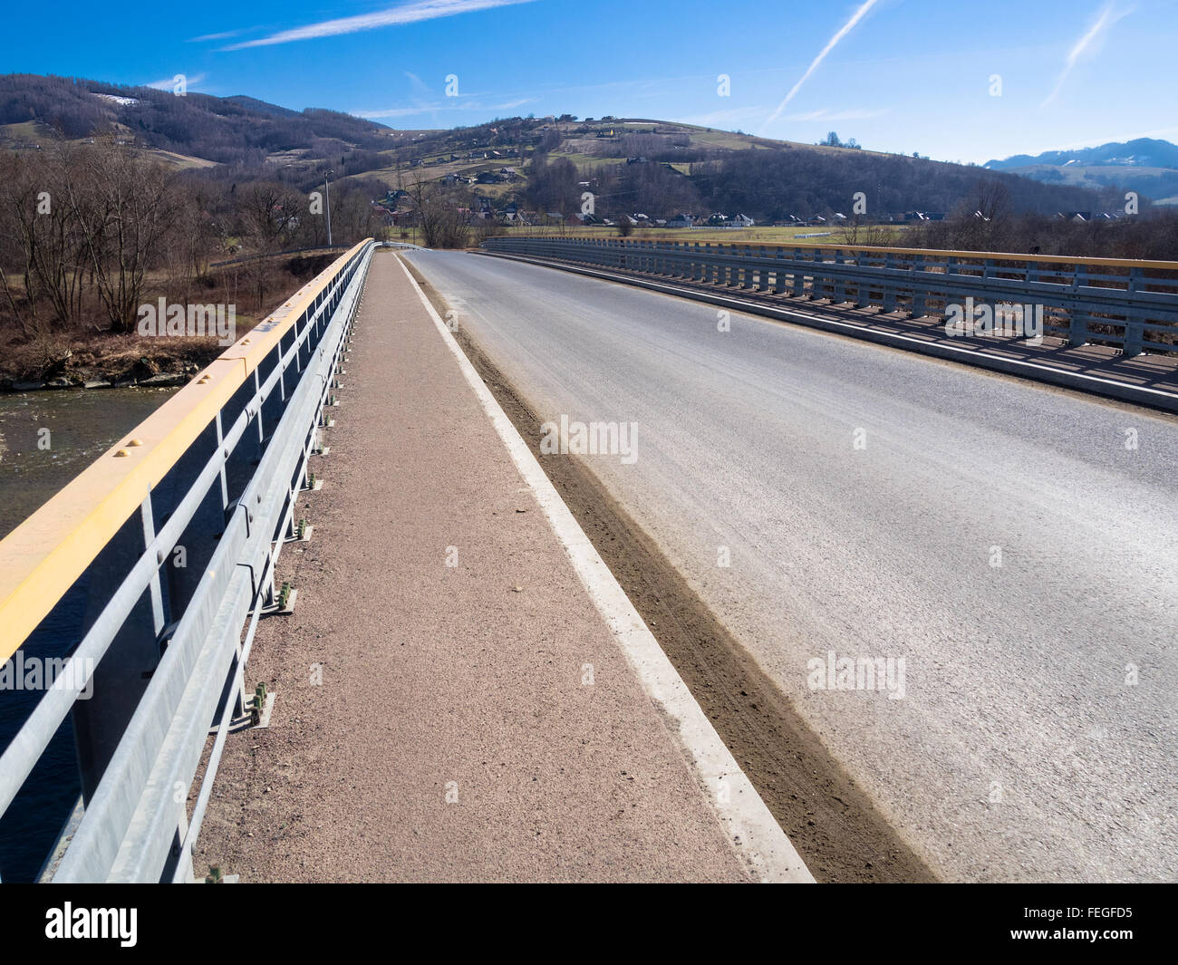 Bridge across The Poprad River near village Barcice in spring, Poland ...