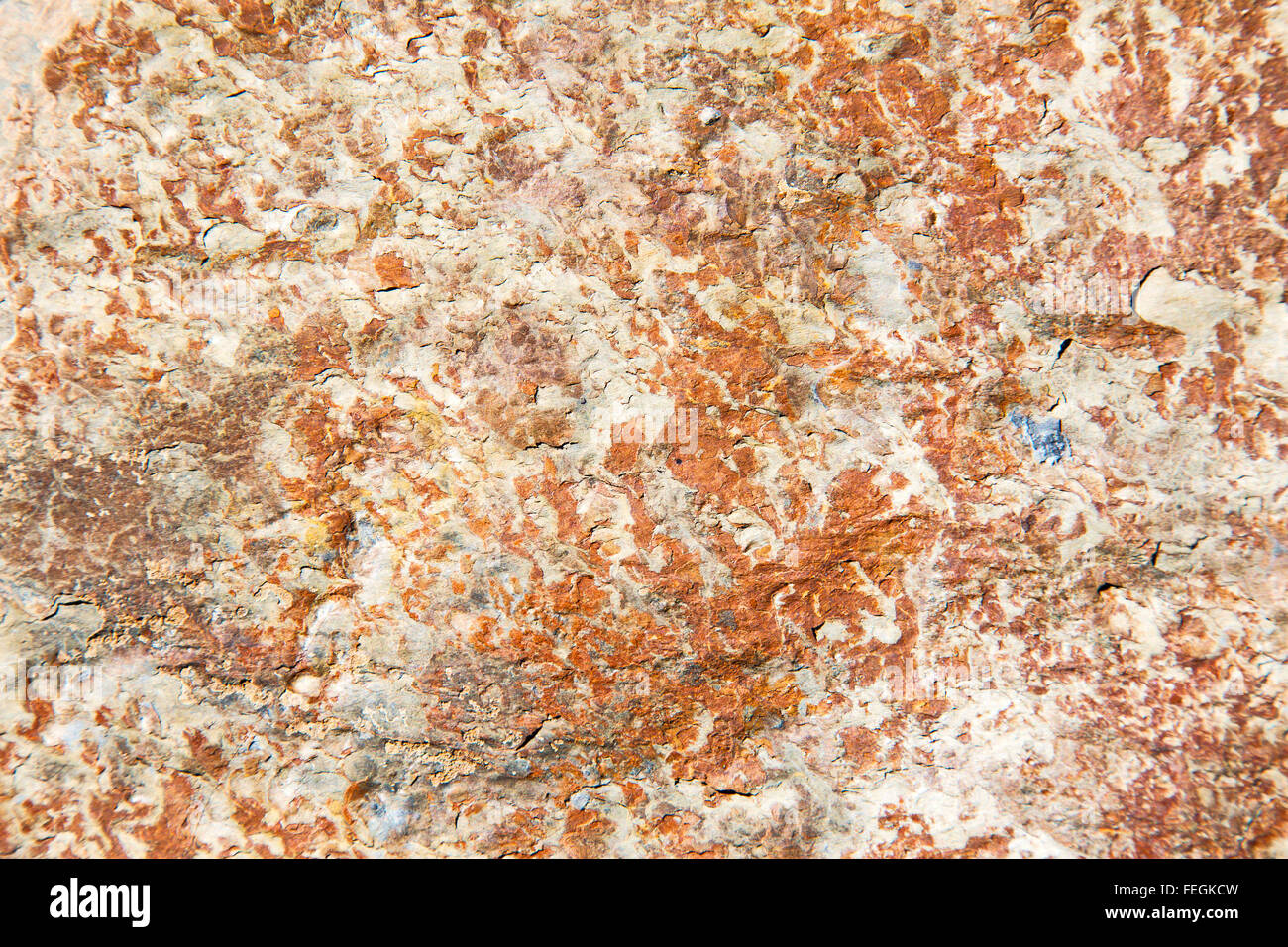 rocks stone and red orange gneiss in the wall of morocco Stock Photo ...