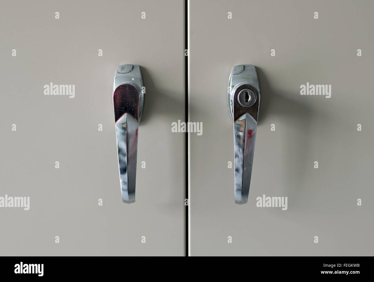Closeup on the handle of the door filing cabinet in the office Stock ...