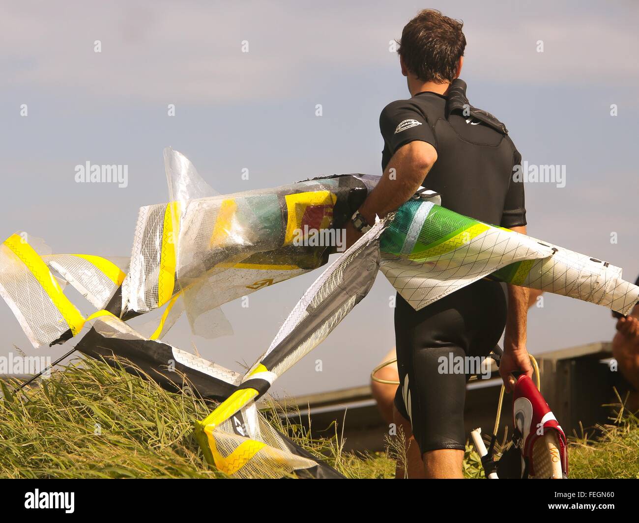 A windsurfer crashed his gear in the waves from Hoʻokipa beach on the ...