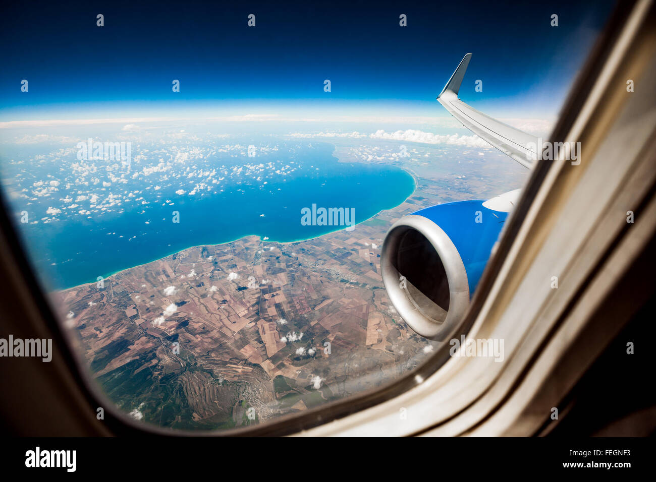Classic image through aircraft window onto jet engine Stock Photo - Alamy