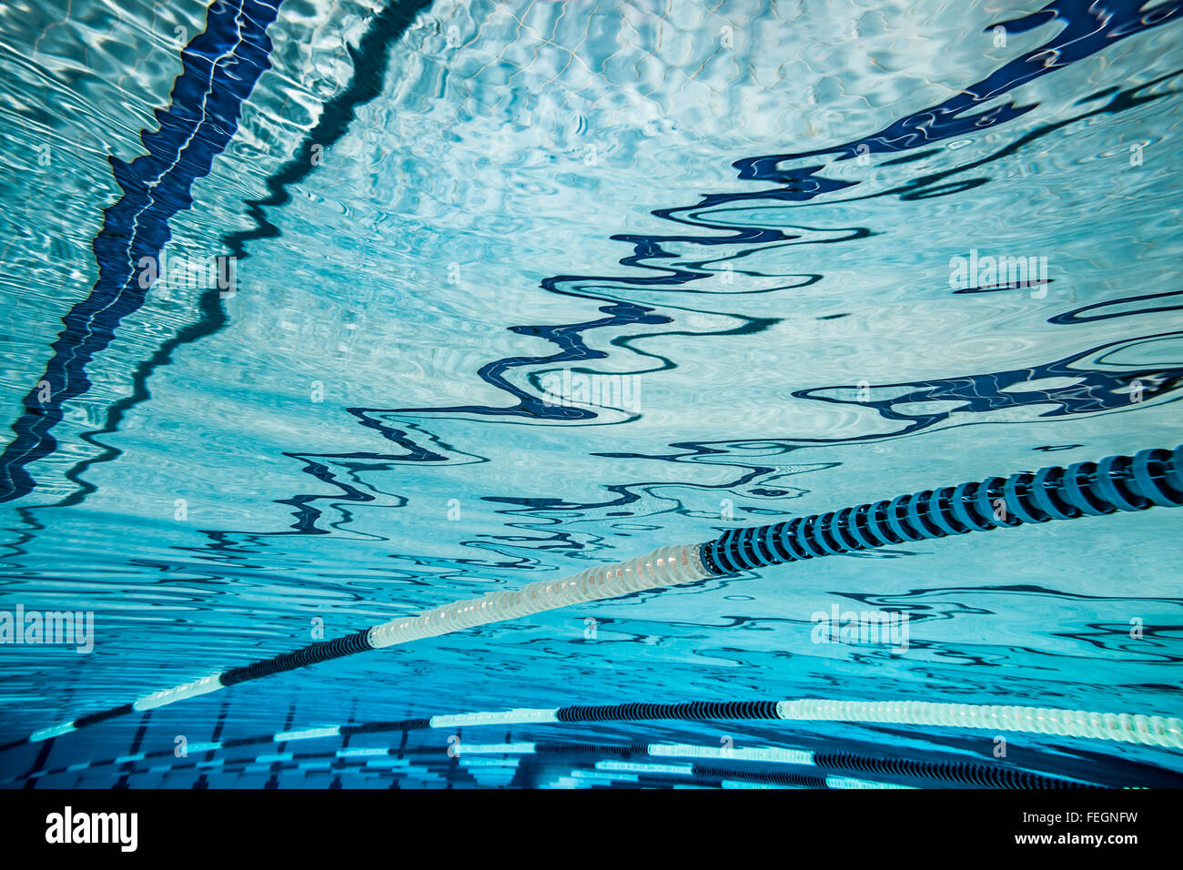 Swimming pool under water background Stock Photo - Alamy