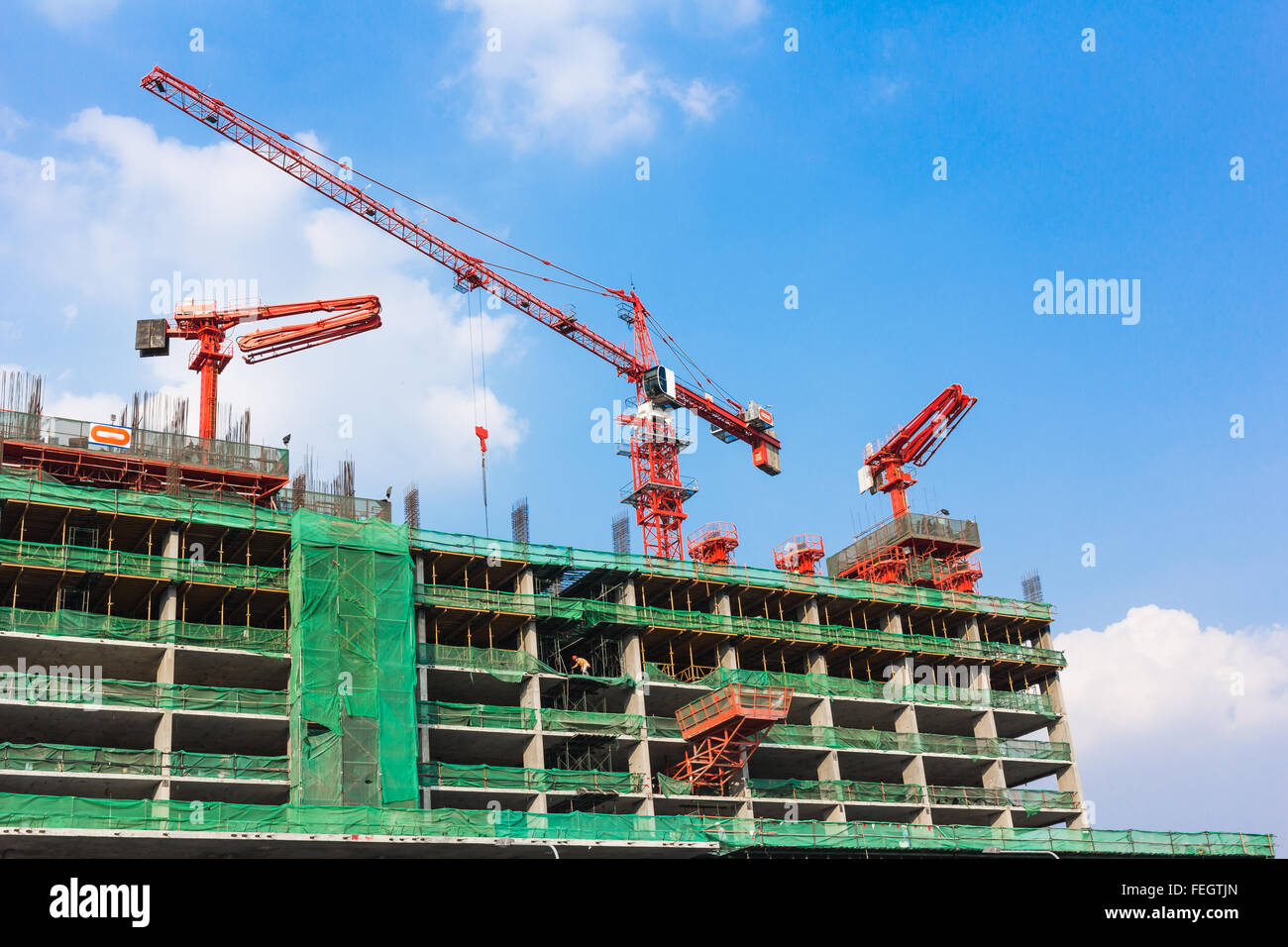 Construction site with crane and building Stock Photo - Alamy