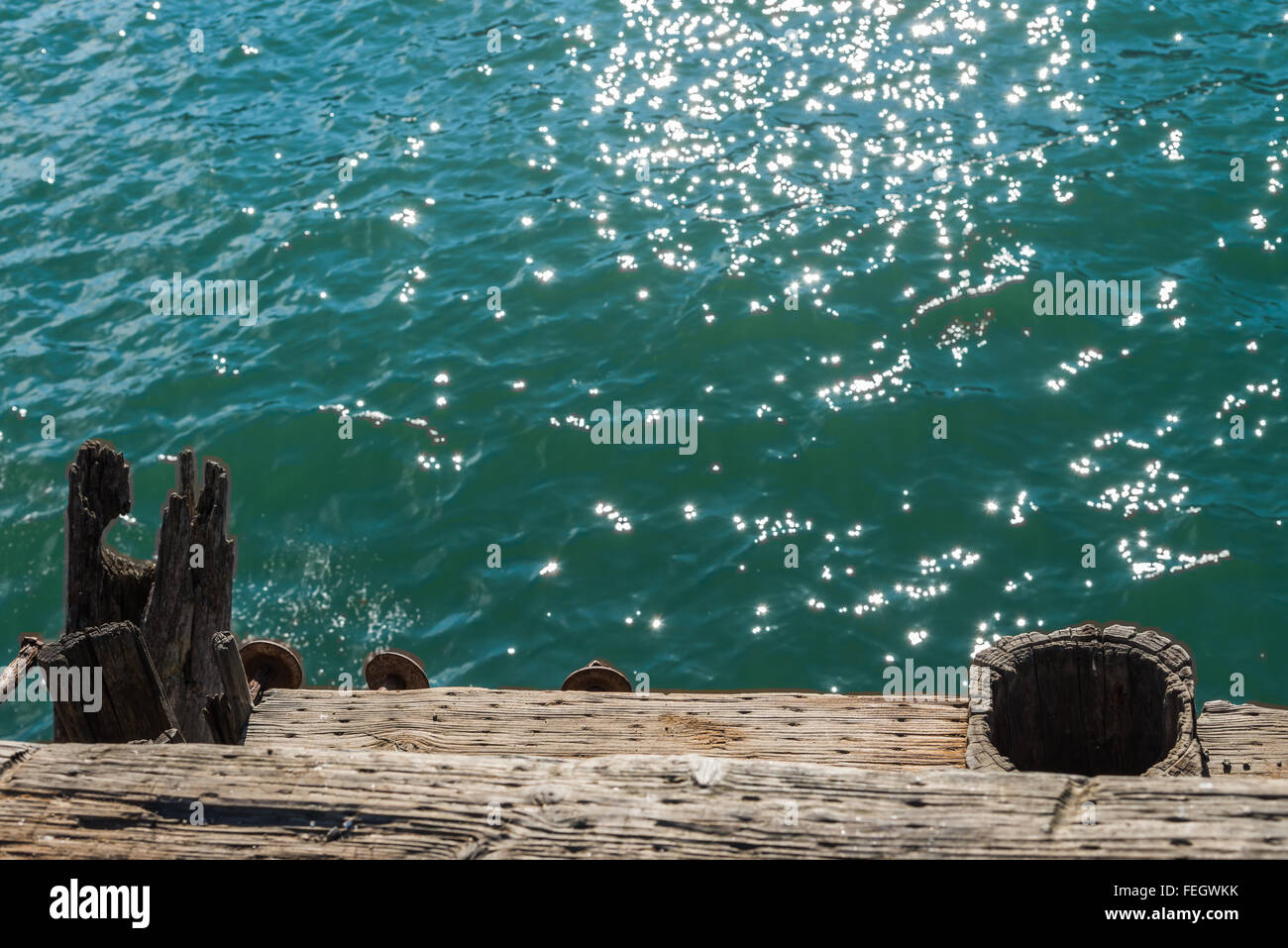 Water glitter and waterside wooden Stock Photo - Alamy