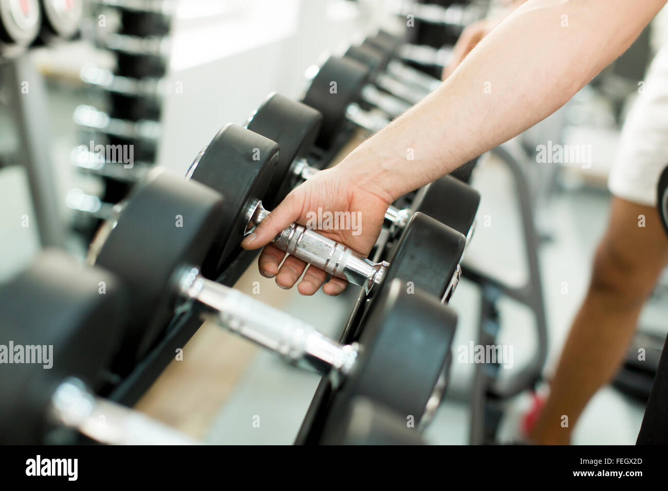 Dumbbell in the gym Stock Photo - Alamy