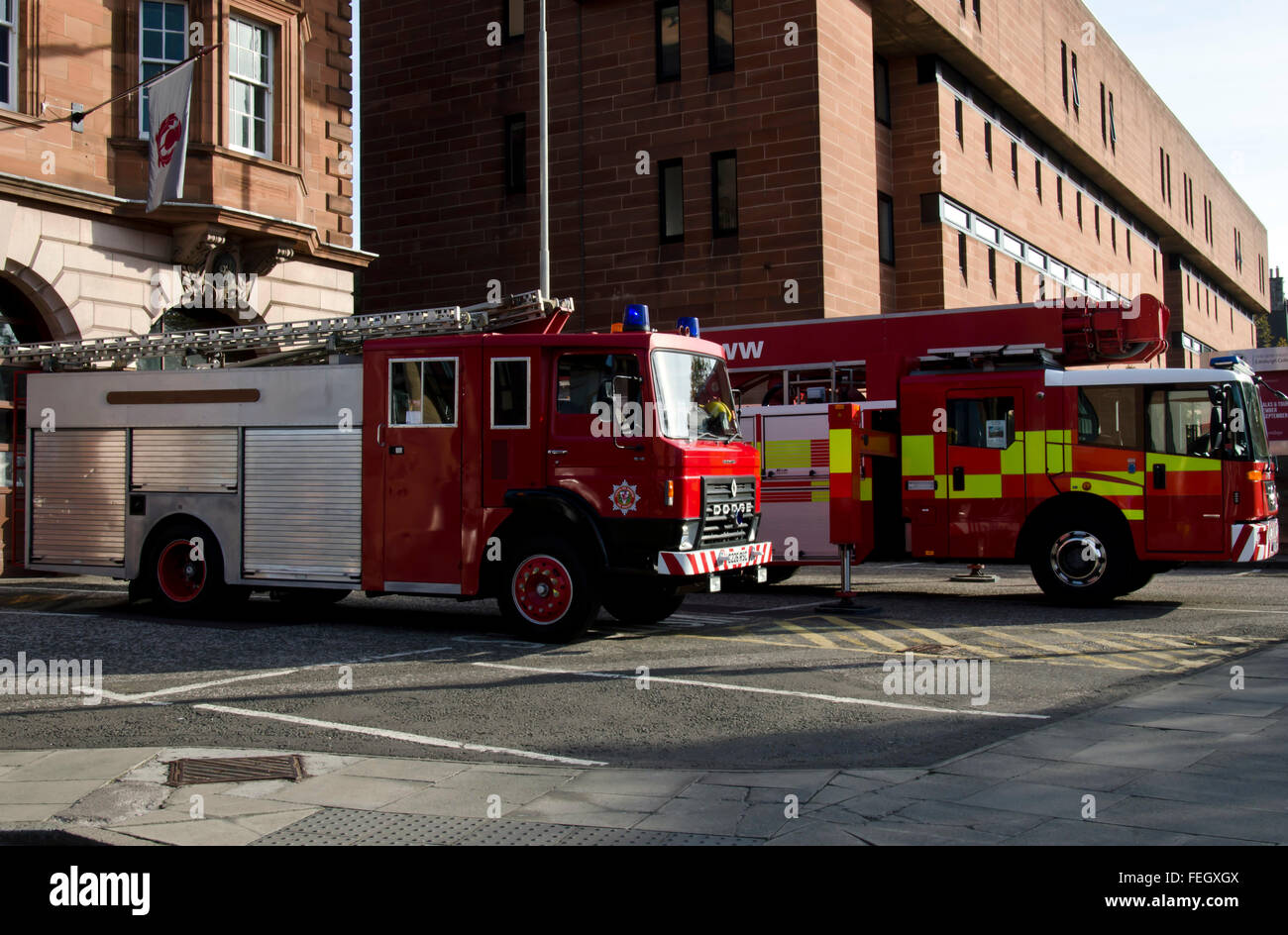 Typical fire engine and modern combined fire pump and fire escape Stock ...