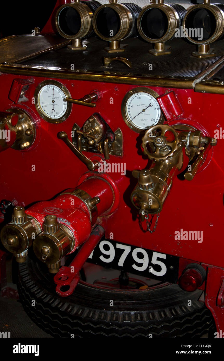 Water pump connectors mounted on the rear of a vintage fire engine in ...