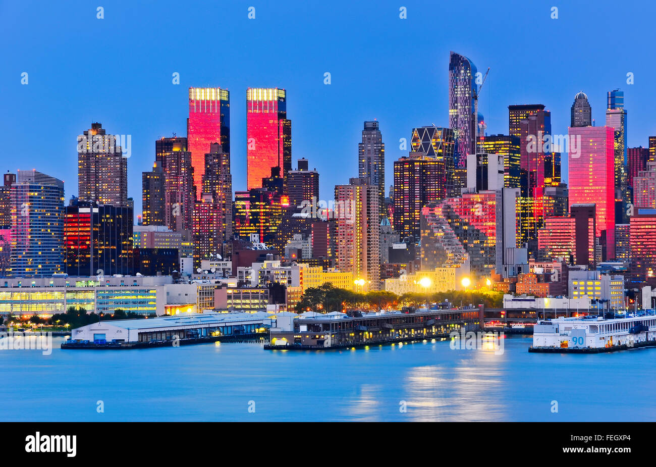 Manhattan skyline with red sunlight reflection at dusk Stock Photo - Alamy