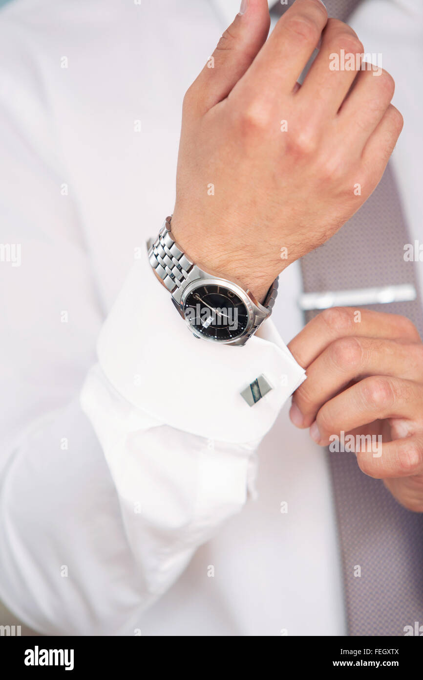 stylish watch on a hand at the man Stock Photo - Alamy