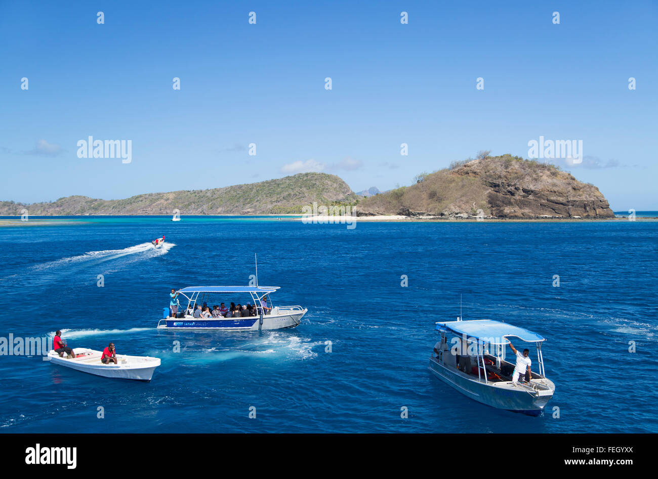 Boats off Mantaray Island Resort, Nanuya Balavu Island, Yasawa Islands ...