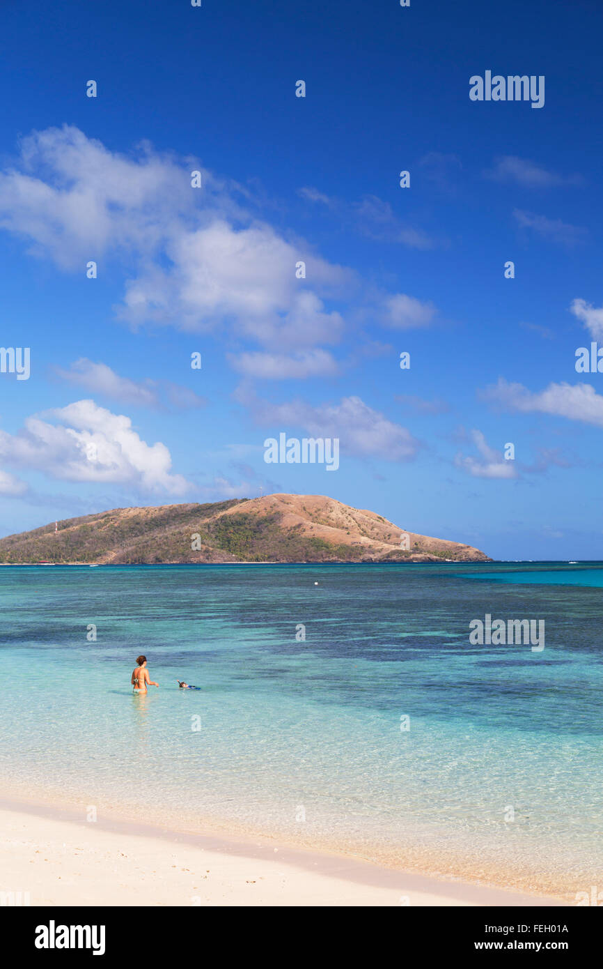 People at beach of Blue Lagoon, Nacula Island, Yasawa Islands, Fiji ...