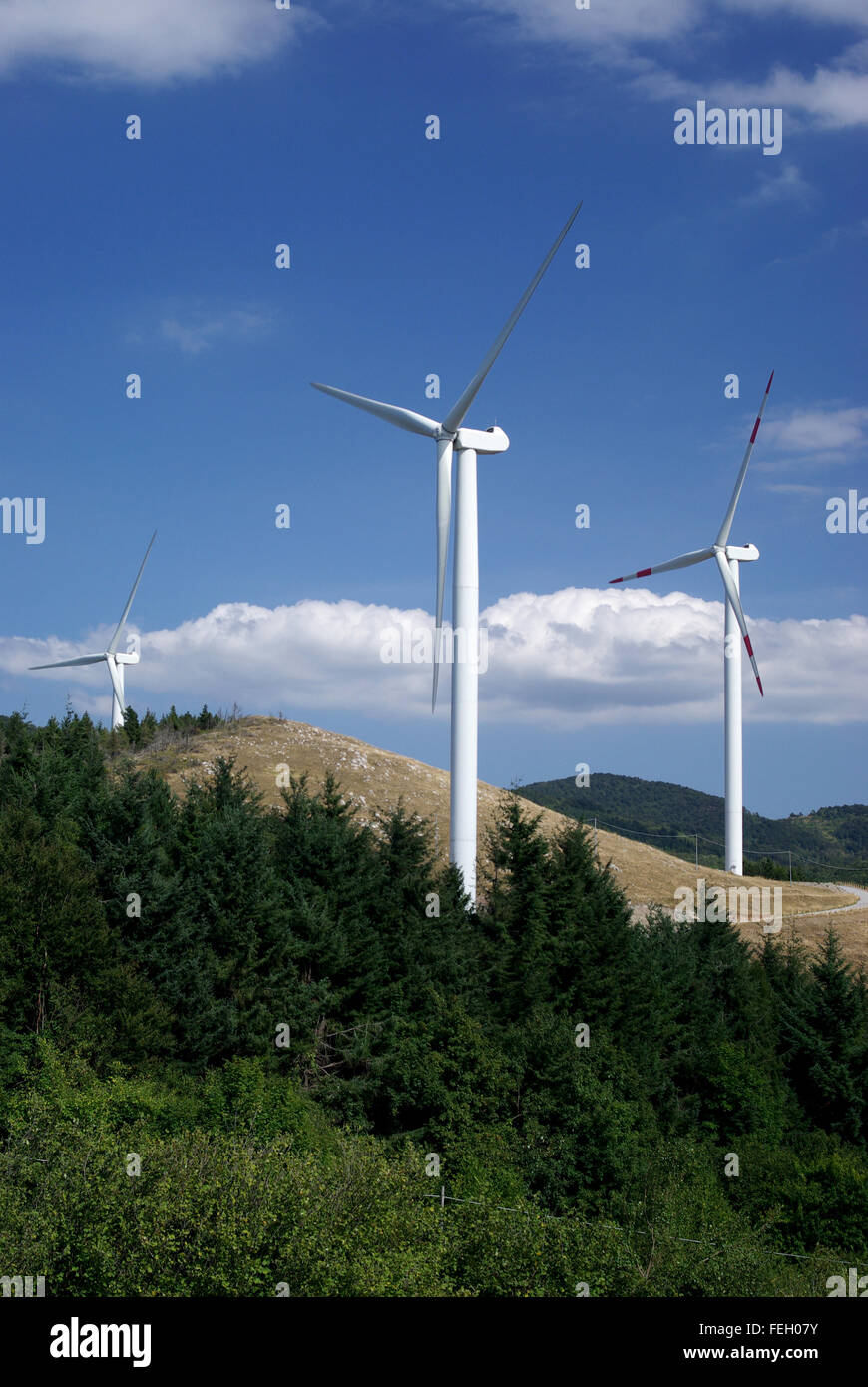 Wind turbines farm in Italian Alps Stock Photo - Alamy