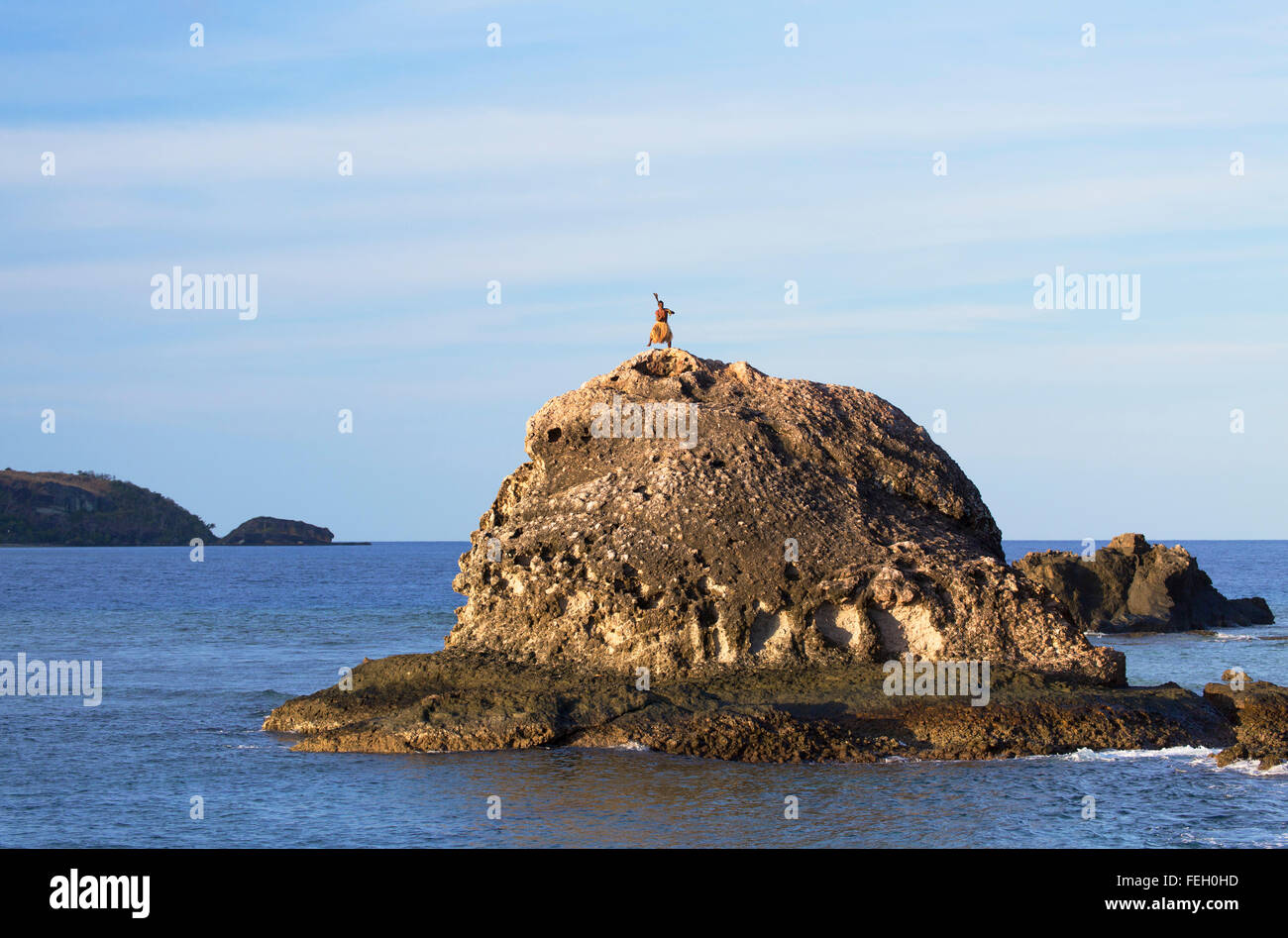Warrior on rock, Kuata Island, Yasawa Islands, Fiji Stock Photo - Alamy