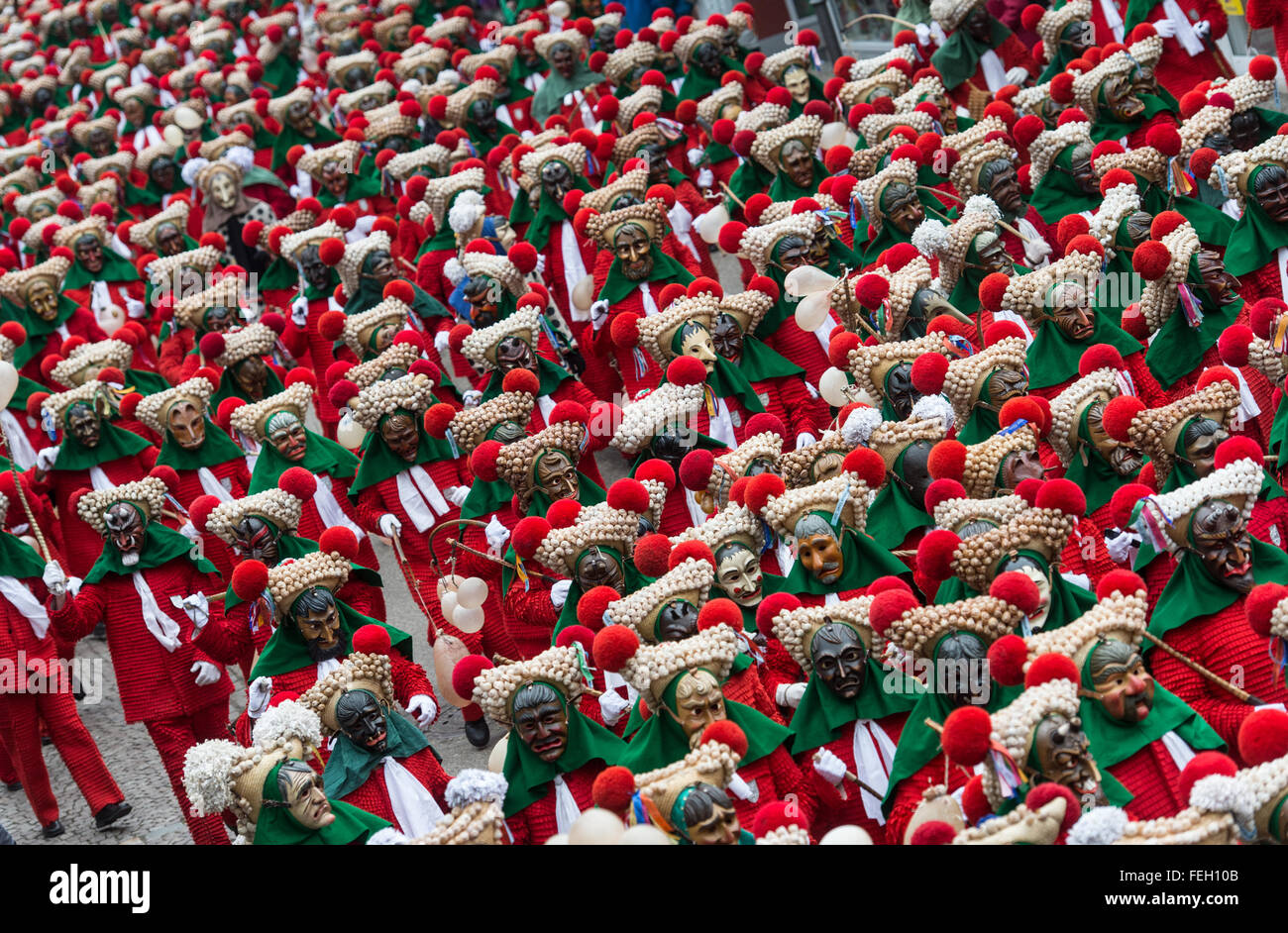 Elzach, Germany. 07th Feb, 2016. Hundreds of people wearing costumes ...