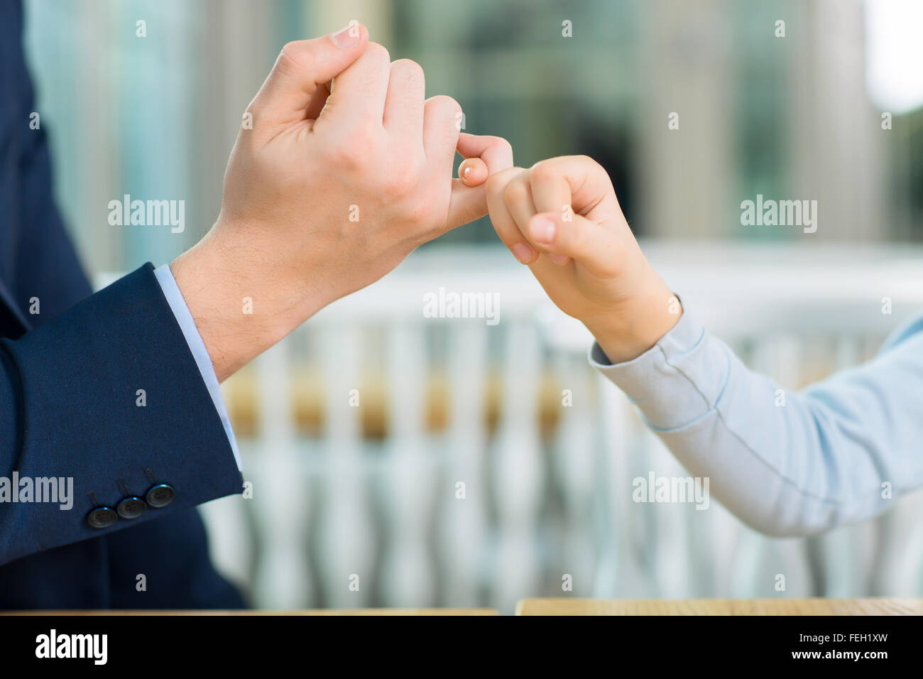 Lovely gesture with little fingers Stock Photo - Alamy