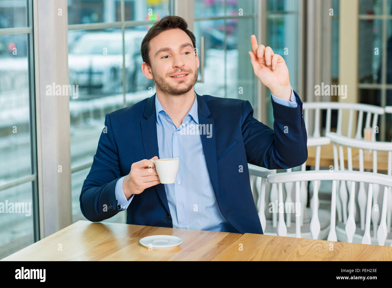 Trying to get attention hi-res stock photography and images - Alamy