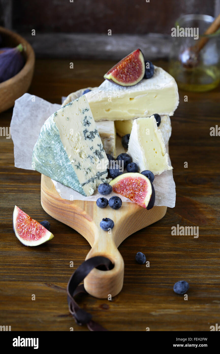 cheese mix on cutting boards, food Stock Photo - Alamy