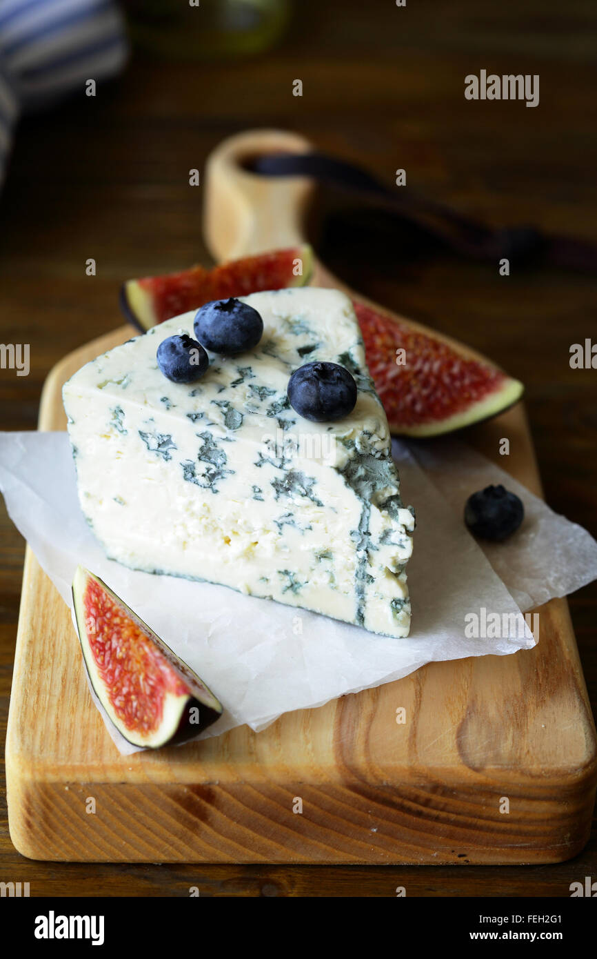 Roquefort cheese with fruits, food closeup Stock Photo - Alamy