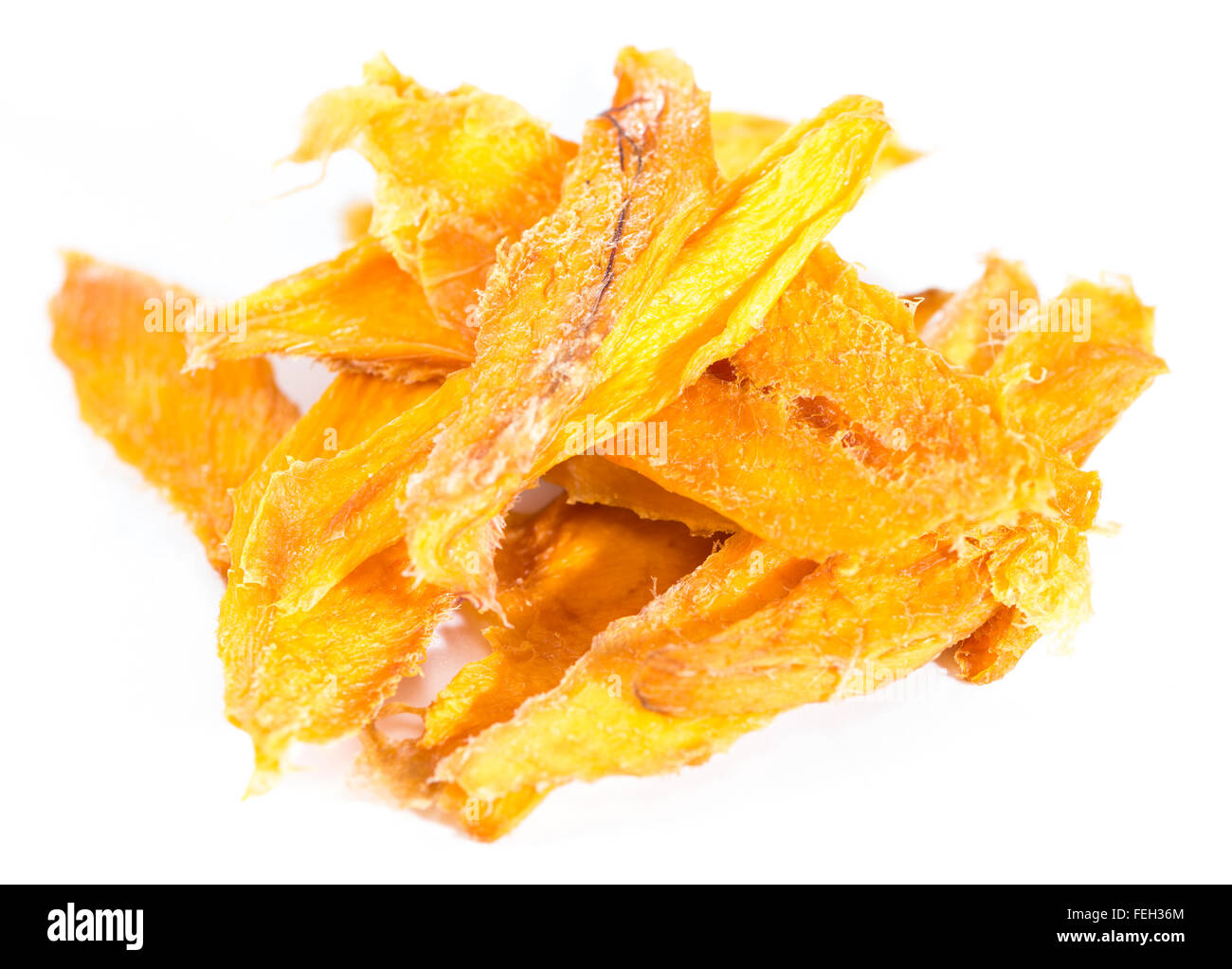 Dried Mango slices isolated on white background Stock Photo - Alamy