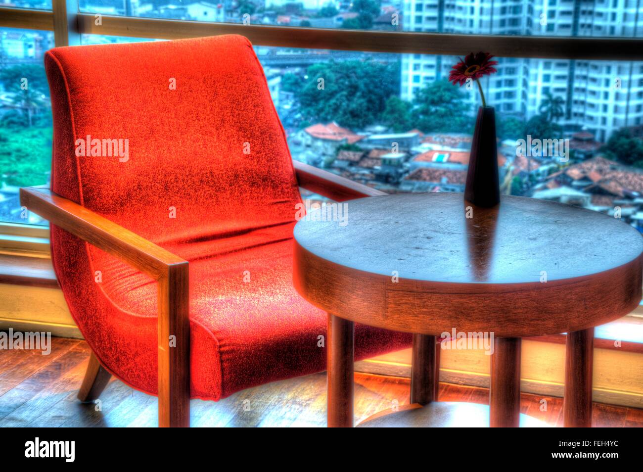 Armchair and coffee table Stock Photo - Alamy