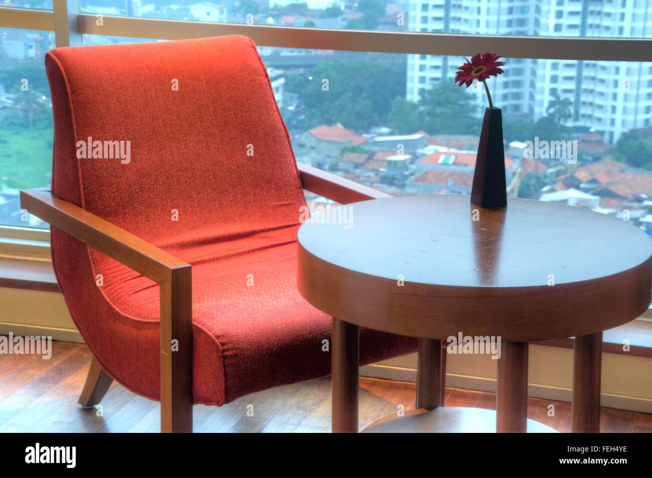 Armchair and coffee table Stock Photo - Alamy