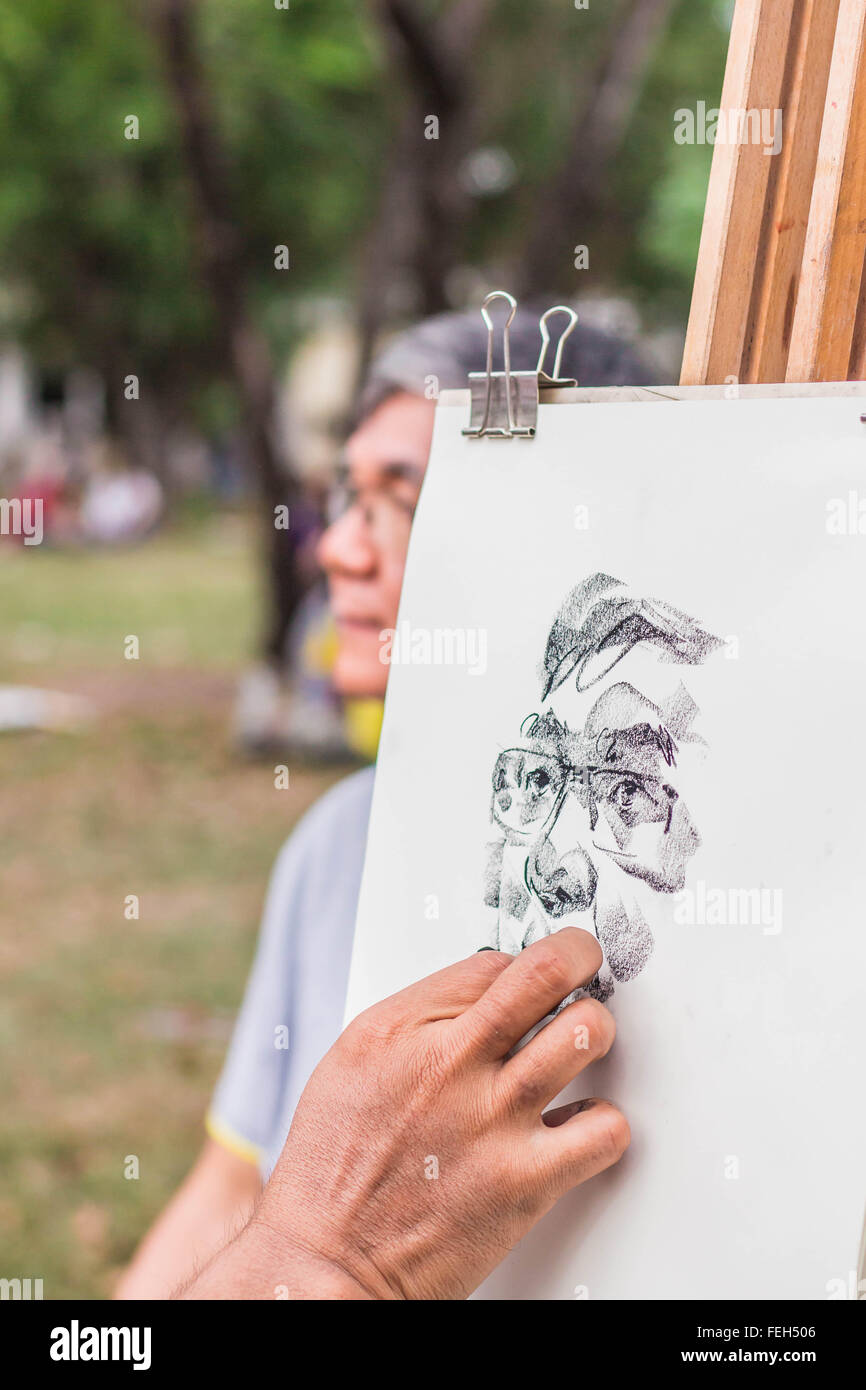 drawing people into the seats Stock Photo - Alamy