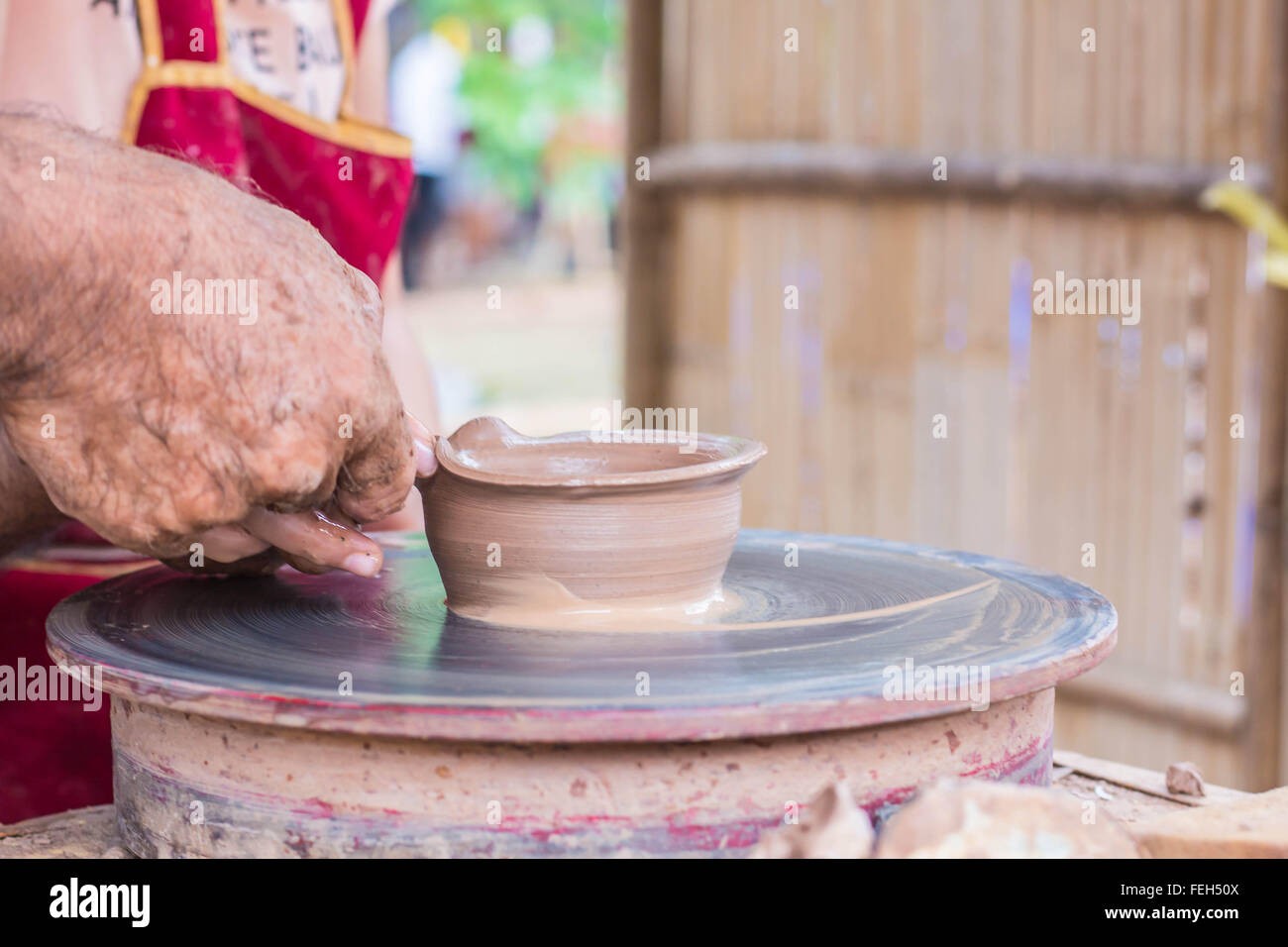 Hand made clay pot bending shape Stock Photo - Alamy