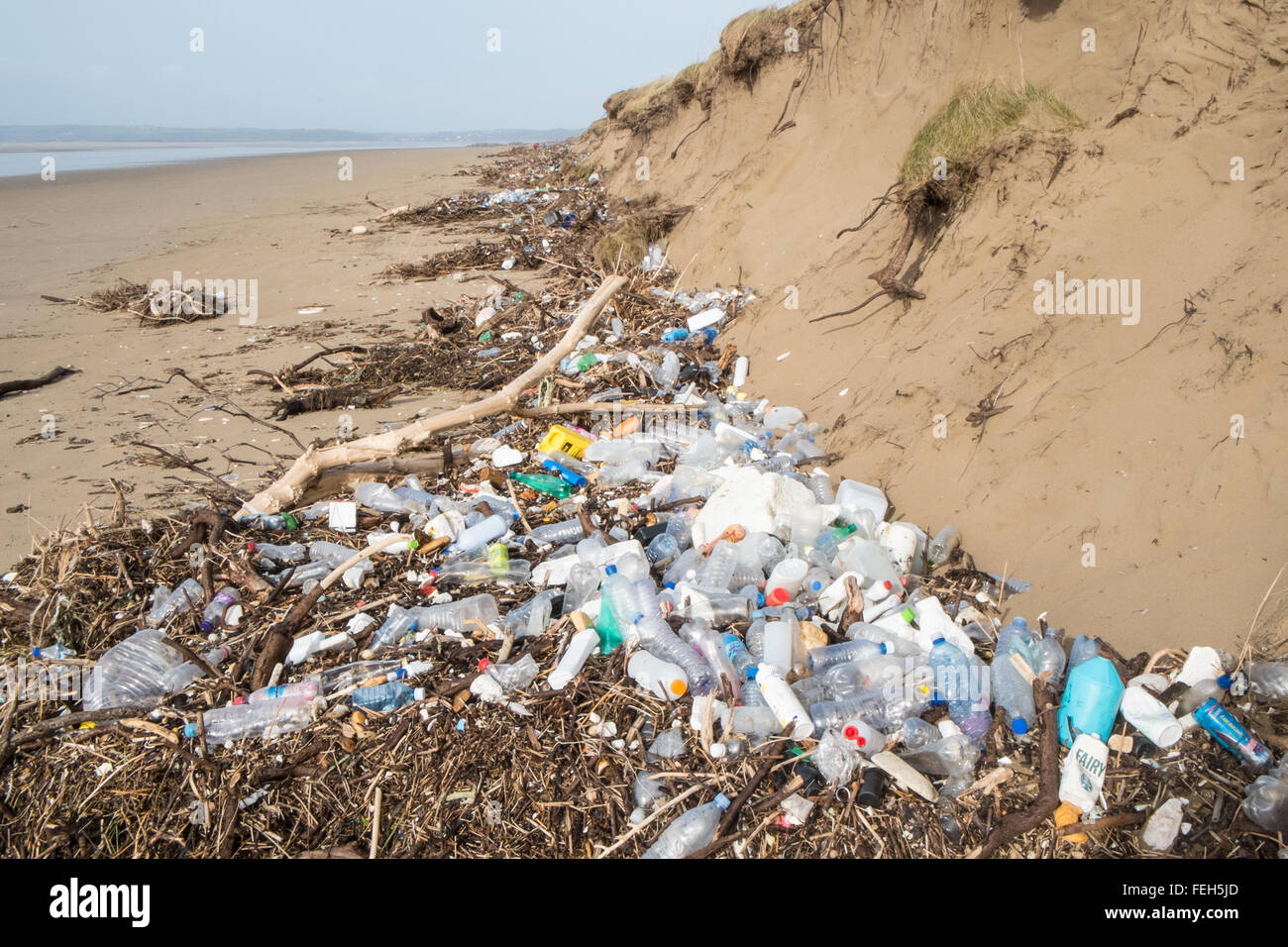 Plastic containers washed up on beach hi-res stock photography and ...