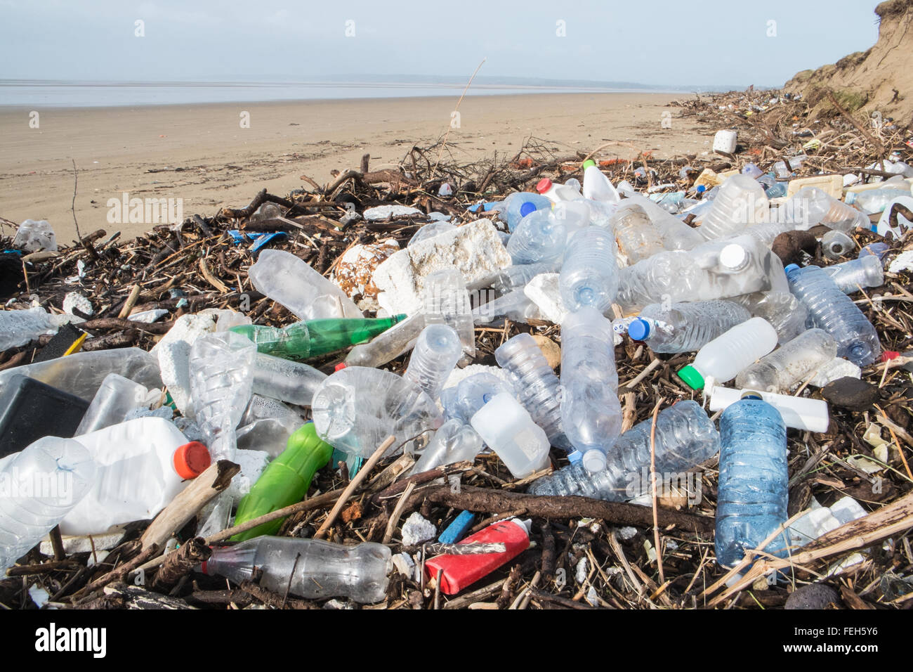 Plastic containers washed up on beach hi-res stock photography and ...