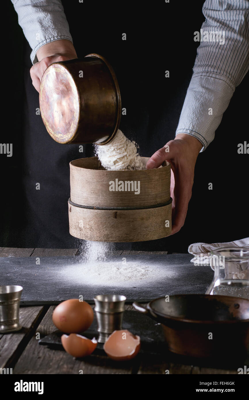 Process sifting flour hands hi-res stock photography and images - Alamy