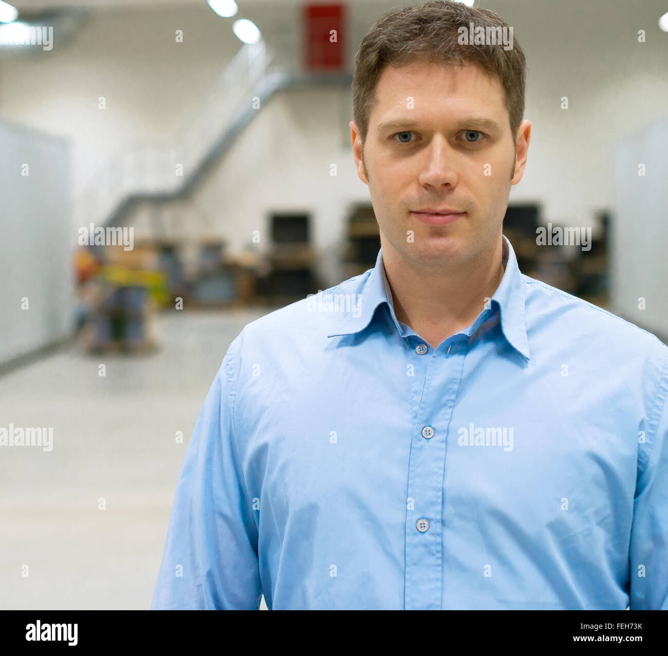 Portrait of handsome supervisor at warehouse Stock Photo - Alamy