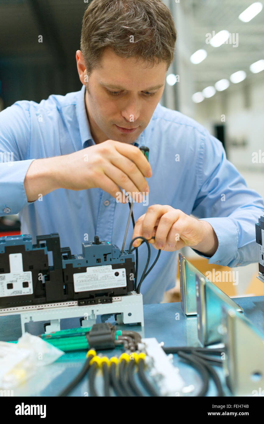 Electronic components conveyor hi-res stock photography and images - Alamy