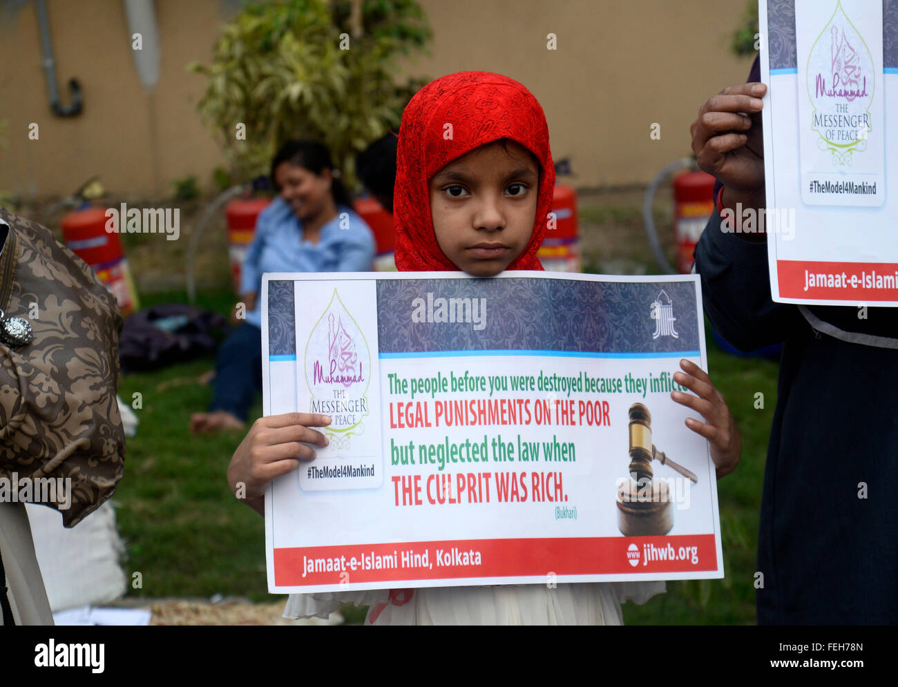 Kolkata, India. 07th Feb, 2016. A Muslim girl with poster during Book ...