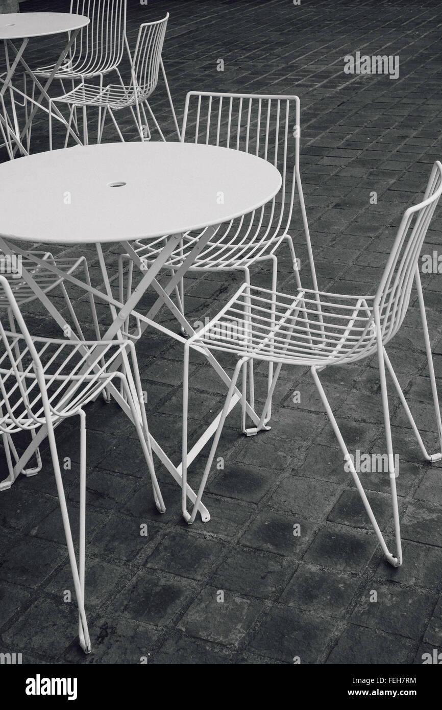 chairs sidewalk pavement Stock Photo - Alamy